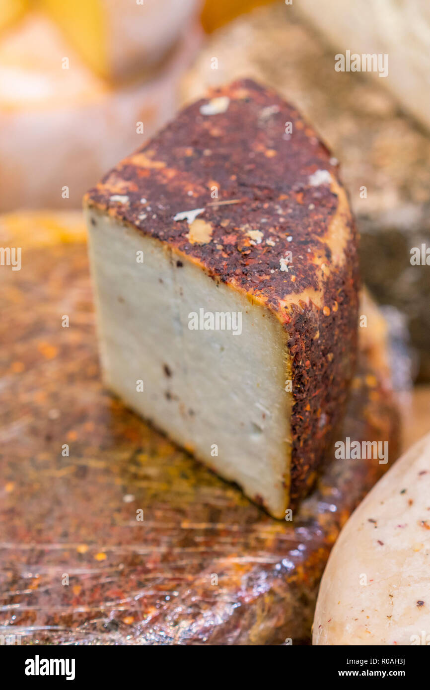 Craft cheese. Cheese head. Artisan cheese. vertical photo Stock Photo ...