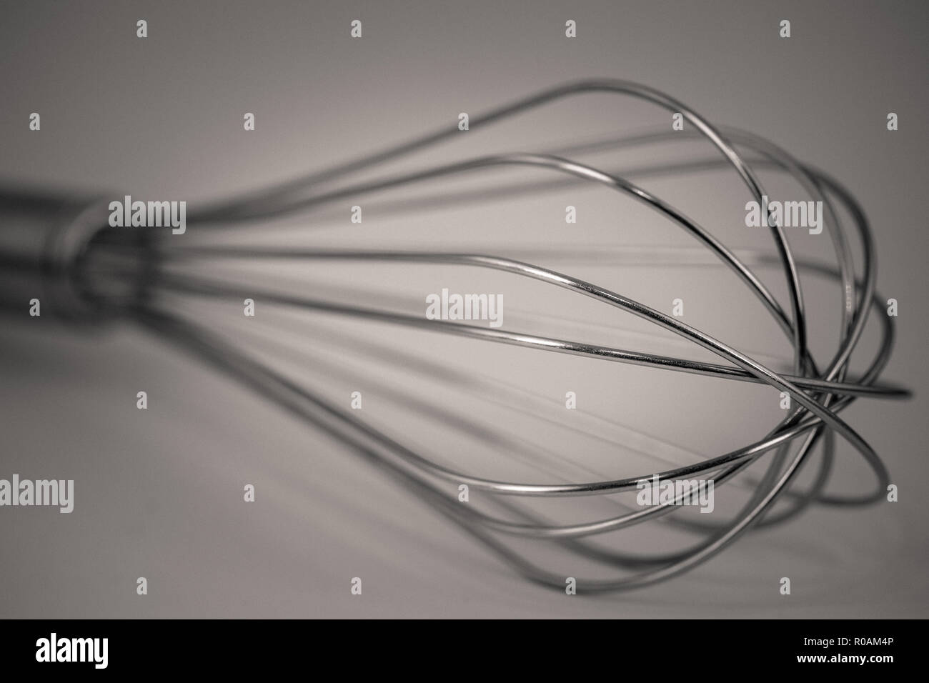 detailed monocrome macro shot of a Metal whisk, kitchen Stock Photo - Alamy