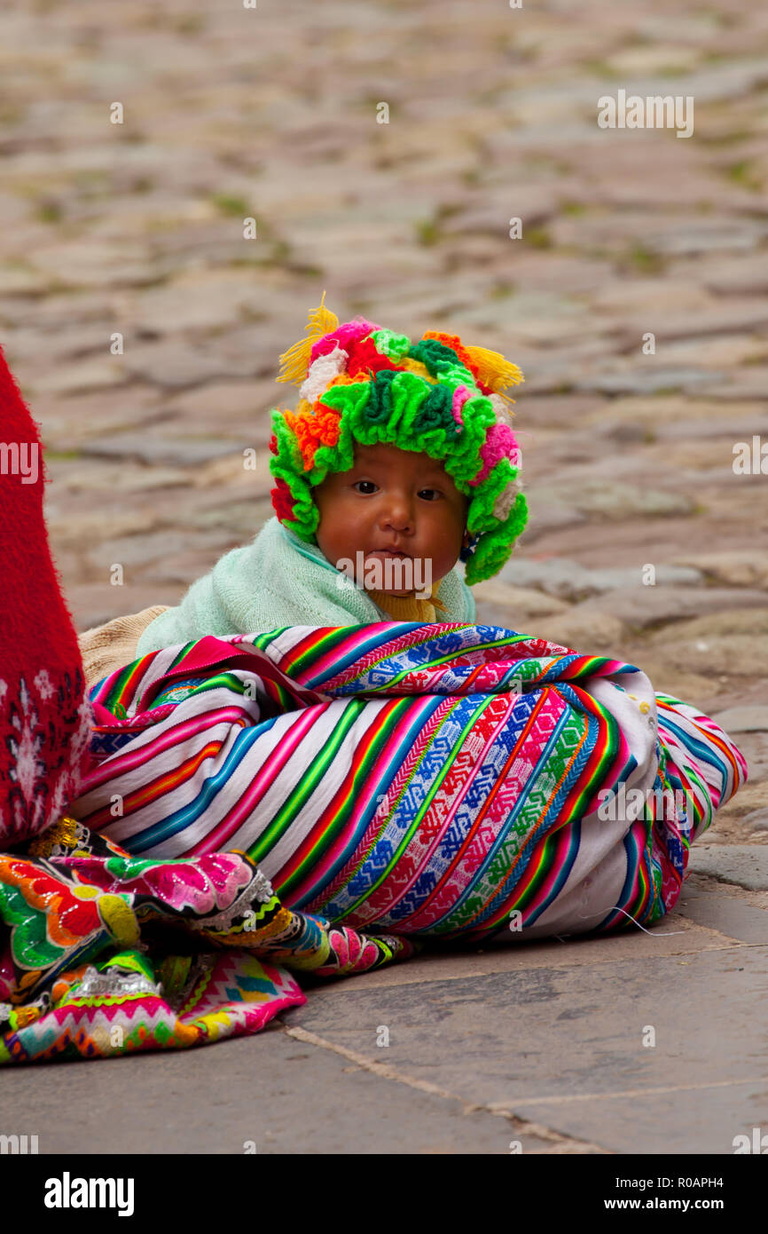 a cute baby with a fancy bonet Stock Photo - Alamy