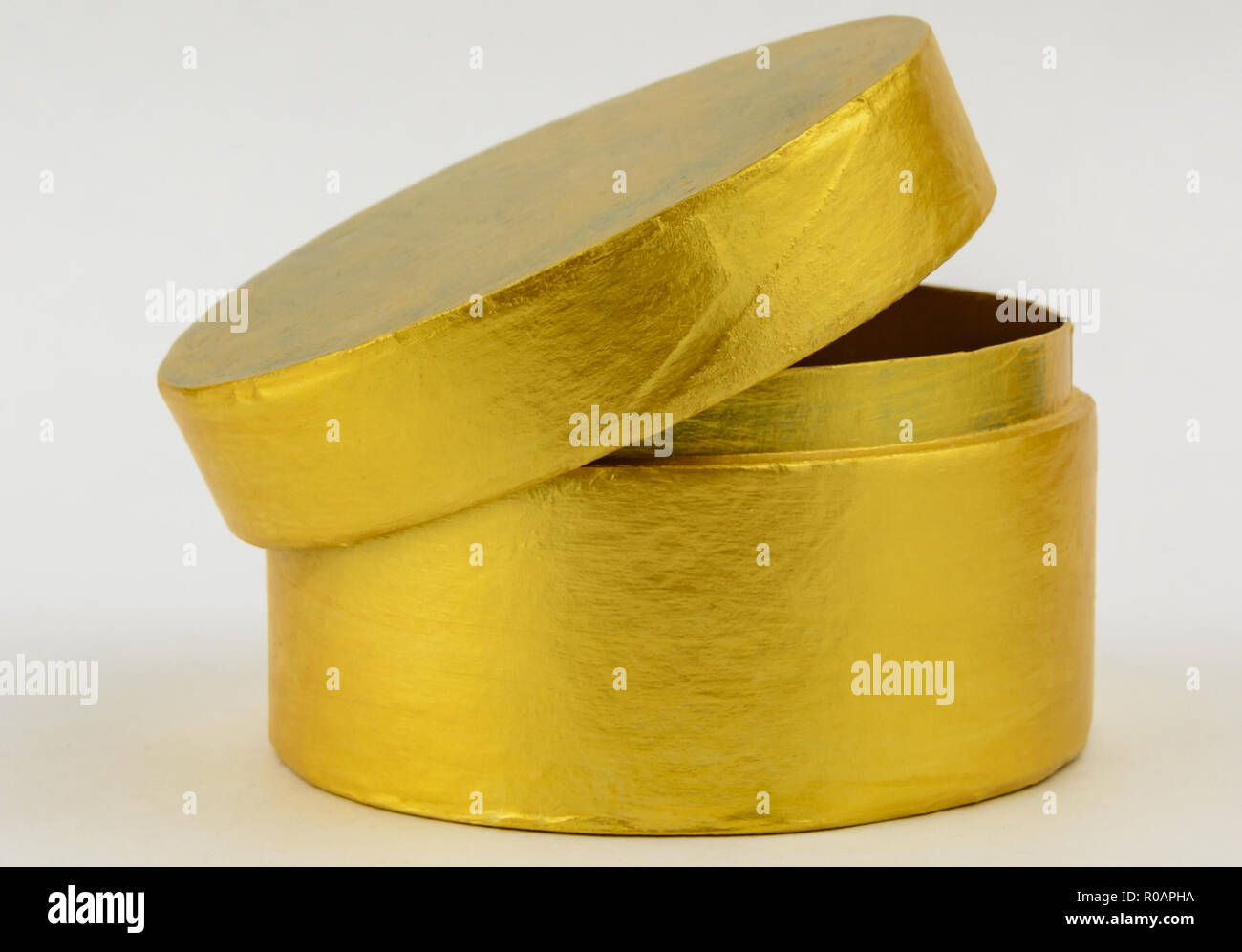 Gold box with lid for jewelry on white background Stock Photo - Alamy