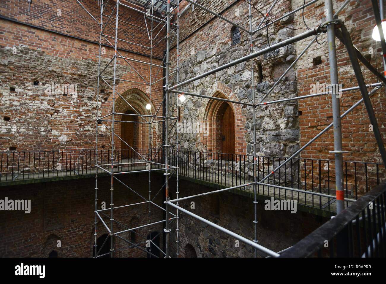 scaffolding for the restoration of the walls of a medieval castle Stock ...