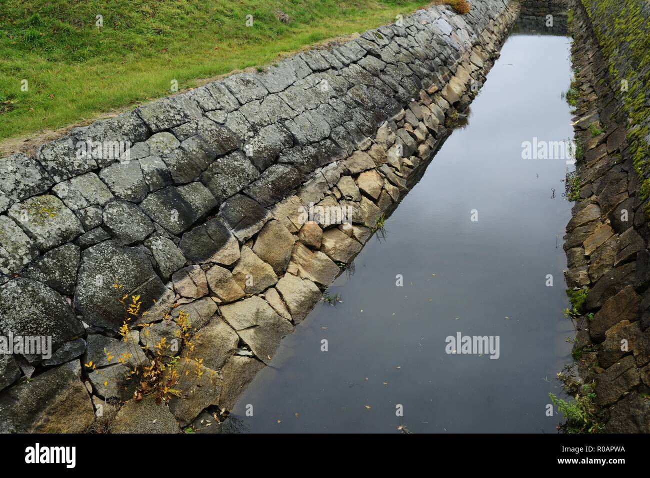 old moat laid out in stone around a medieval fortress Stock Photo - Alamy