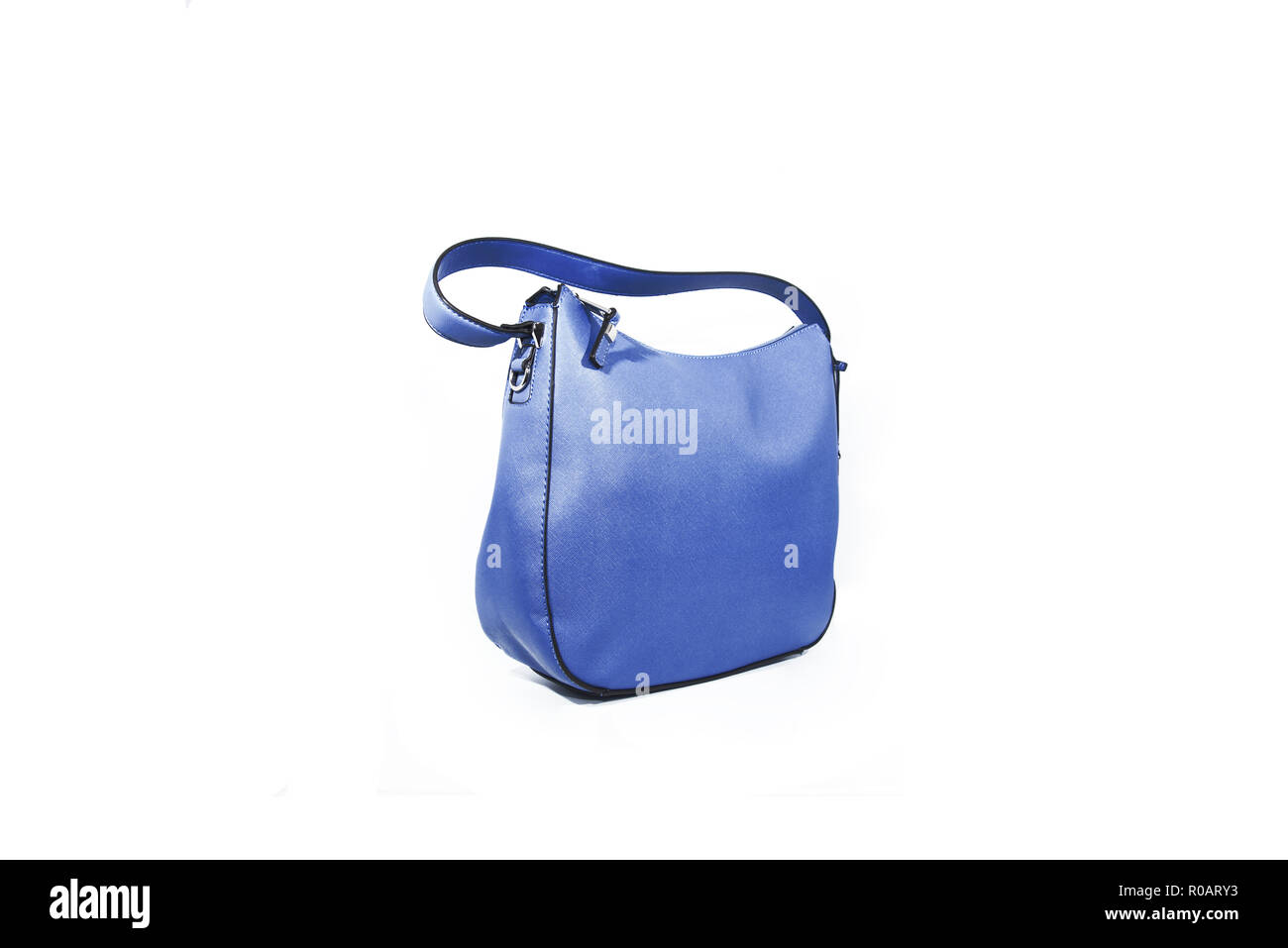 Empty blue ladies handbag isolated on white background Stock Photo - Alamy