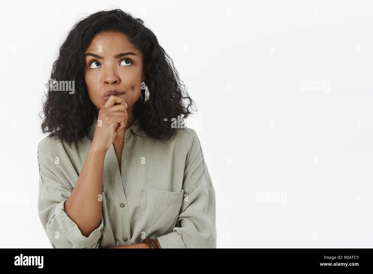Girl needs make up excuse thinking standing focused in thoughtful pose ...