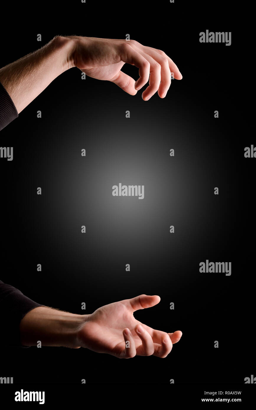 Hands of magician Stock Photo - Alamy