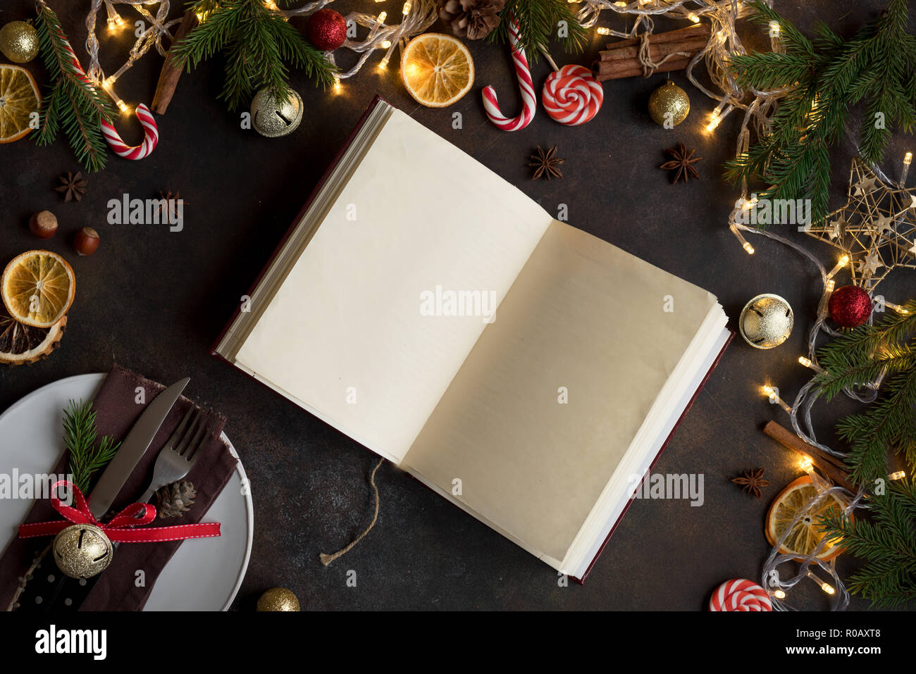 Christmas Cookbook or Menu on dark table. Empty cook book, recipes book ...