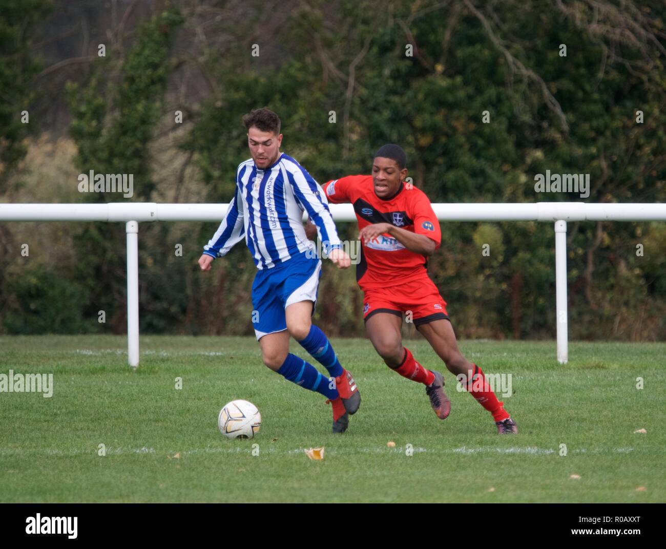 Football action from an amateur match between Whaley Bridge Athletic ...