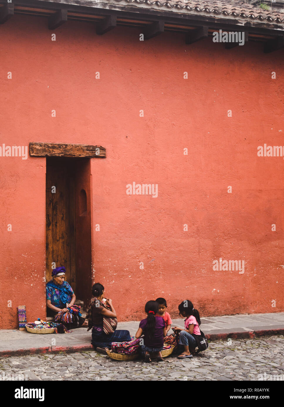 Matriarch of Guatemalan family in traditional Mayan dress sells ...