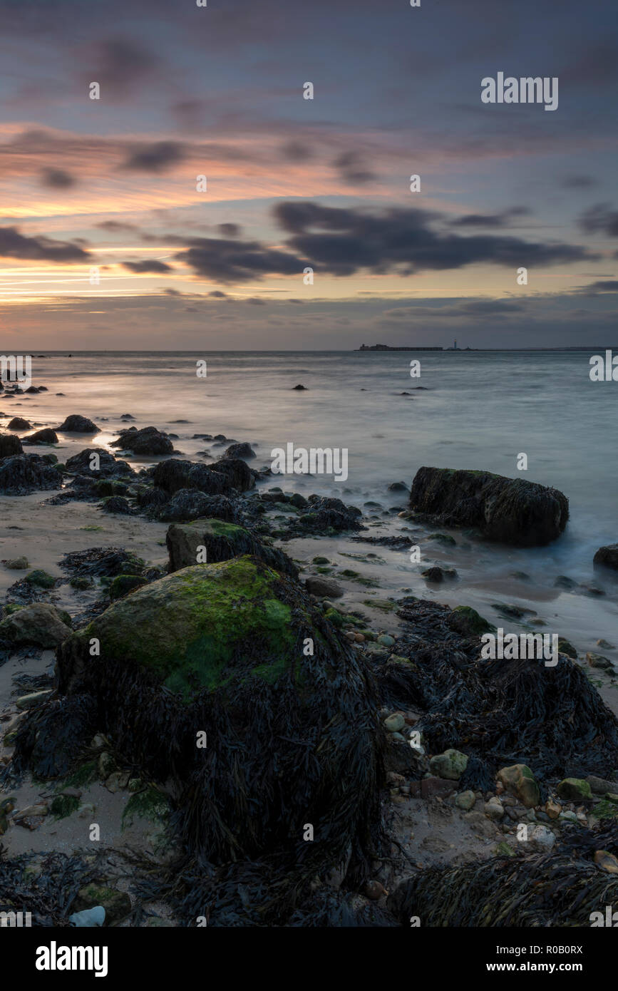 a beautiful and atmospheric seascape from a beach on the isle of wight ...