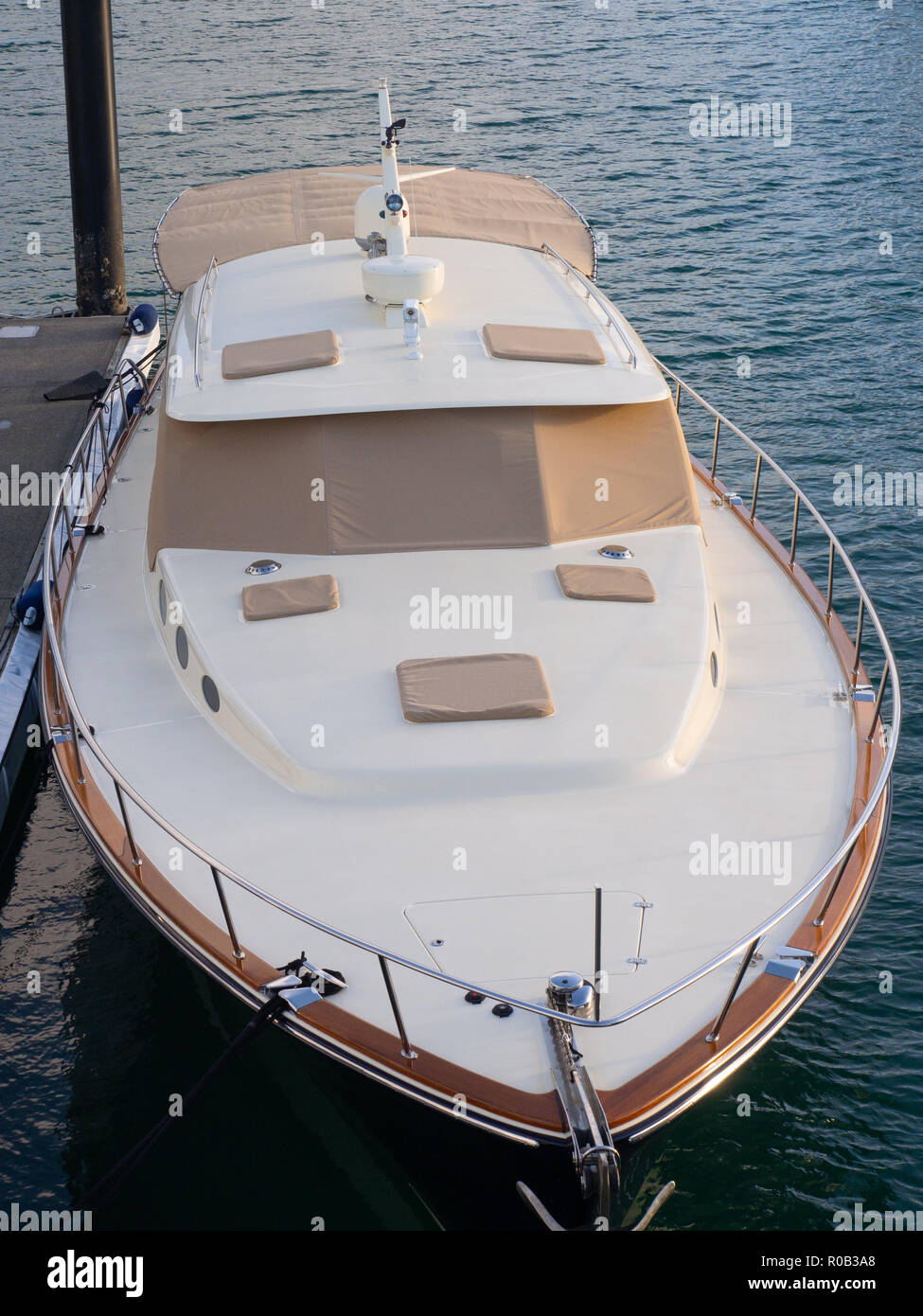White boat docked on pier hi-res stock photography and images - Alamy