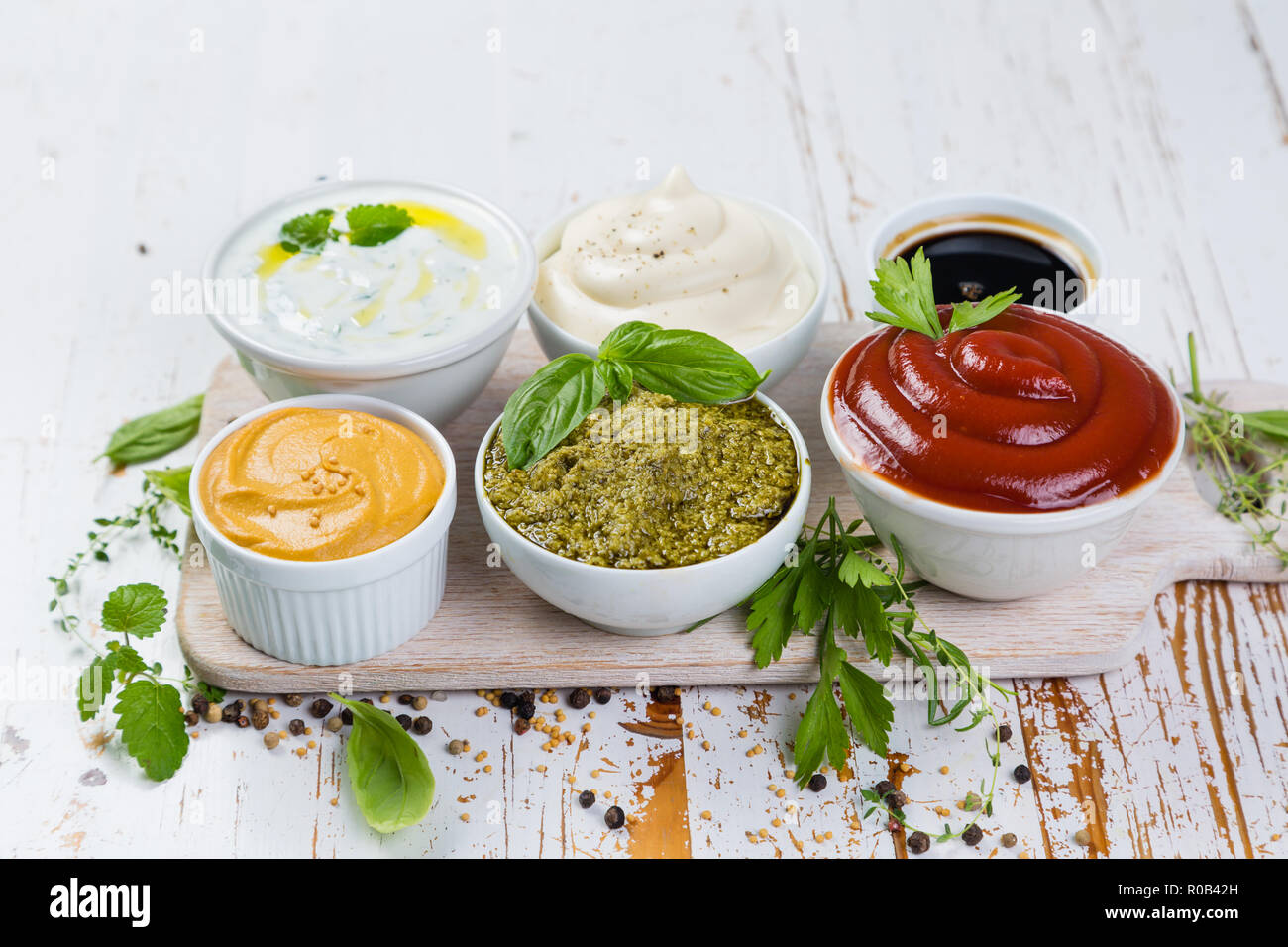 Selection of different sauces in bowls Stock Photo - Alamy