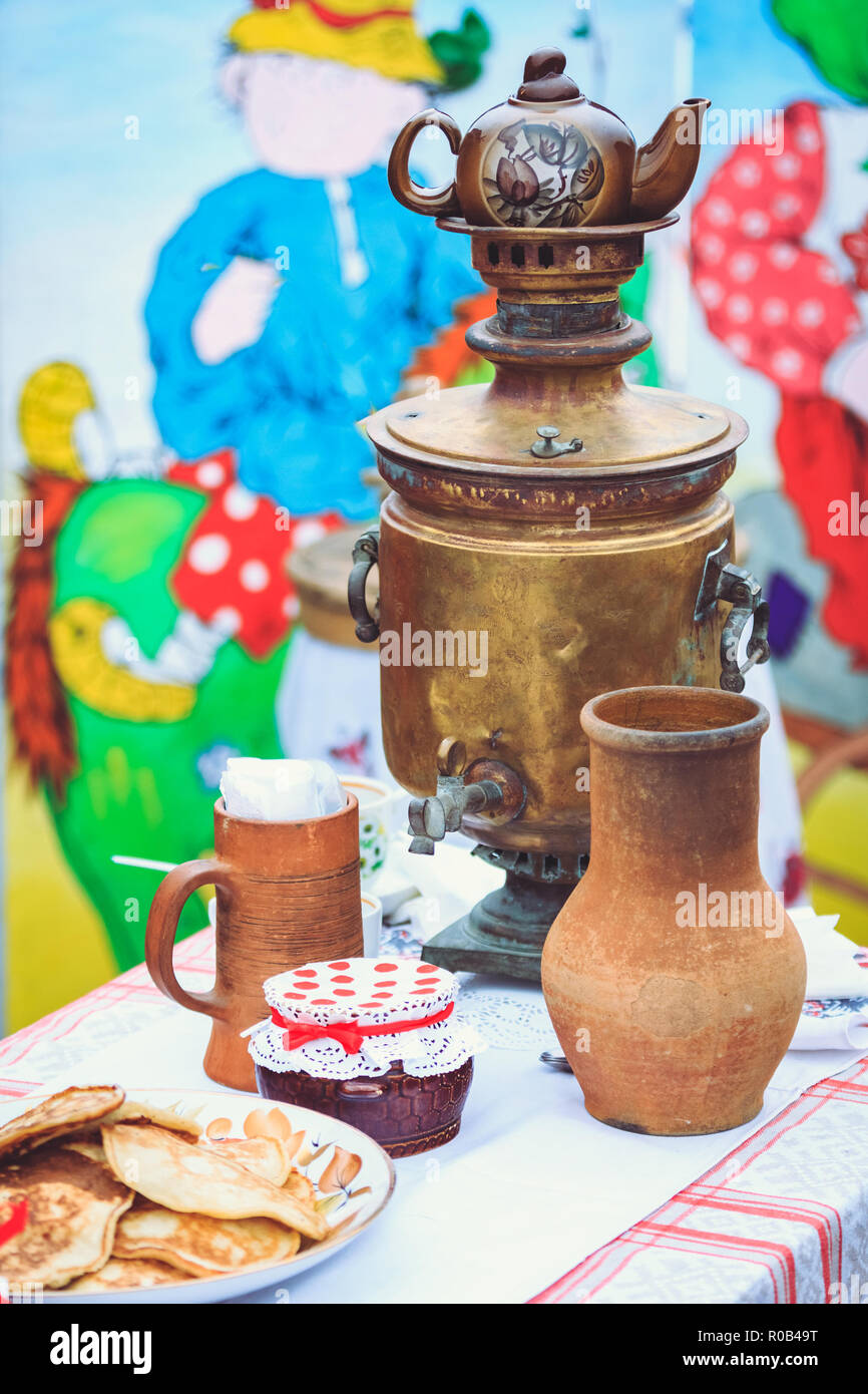 Rustic old cookware with a copper samovar vintage style Stock Photo - Alamy