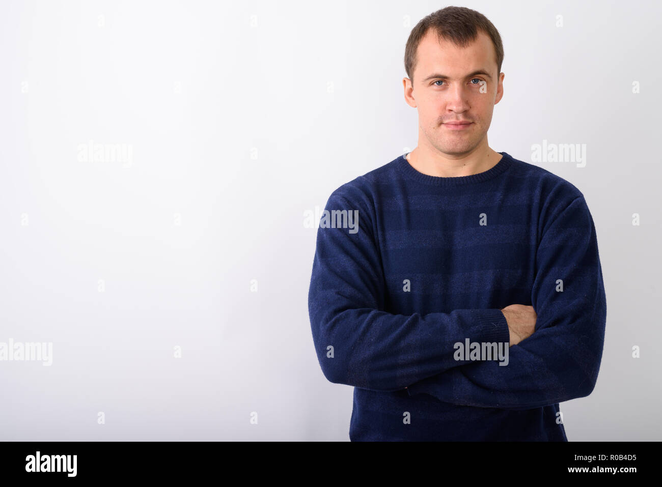 Muscular man crossed arms hi-res stock photography and images - Alamy
