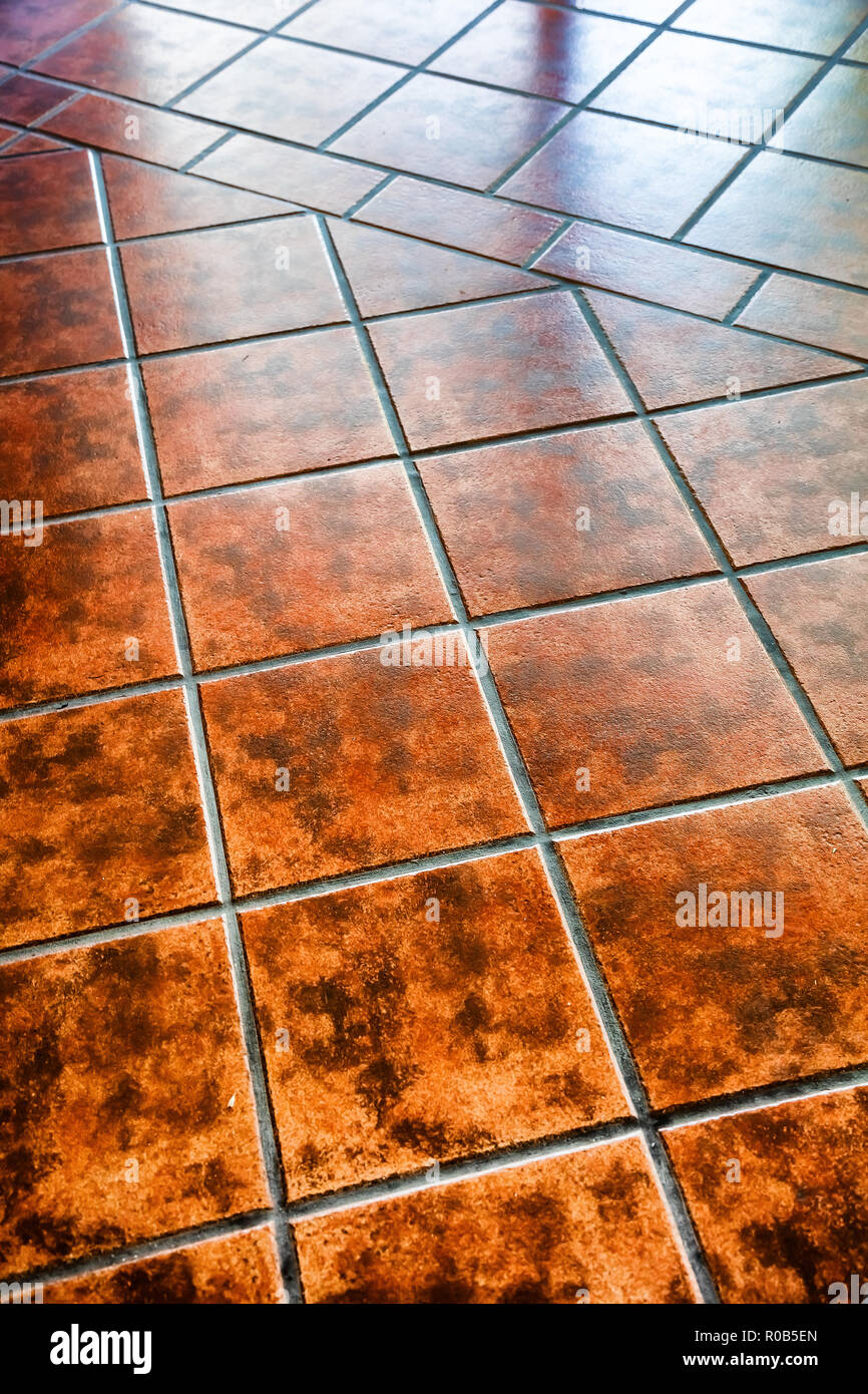 Modern tile floor with textured decor Stock Photo - Alamy