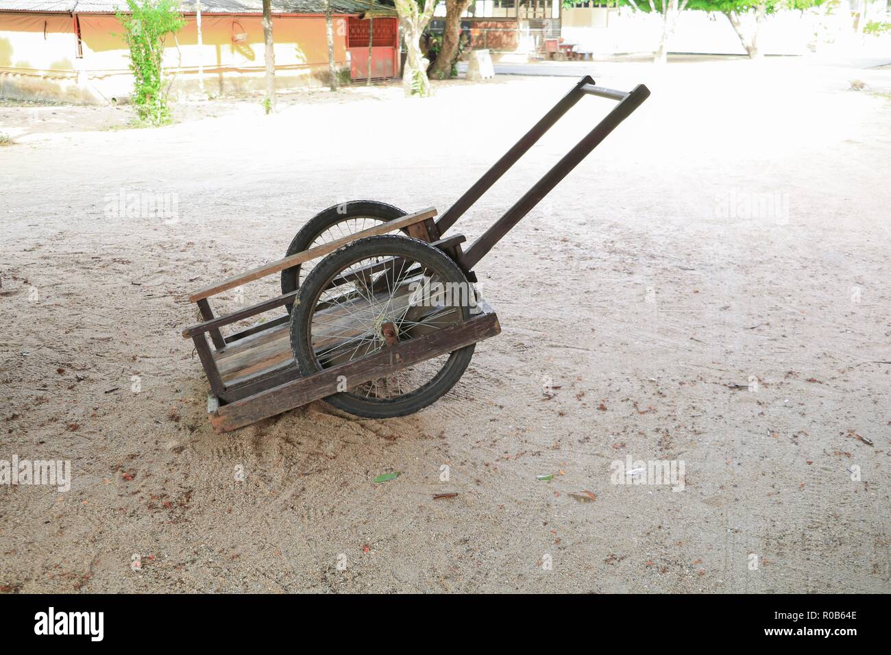 wooden barrow old two wheel Stock Photo - Alamy