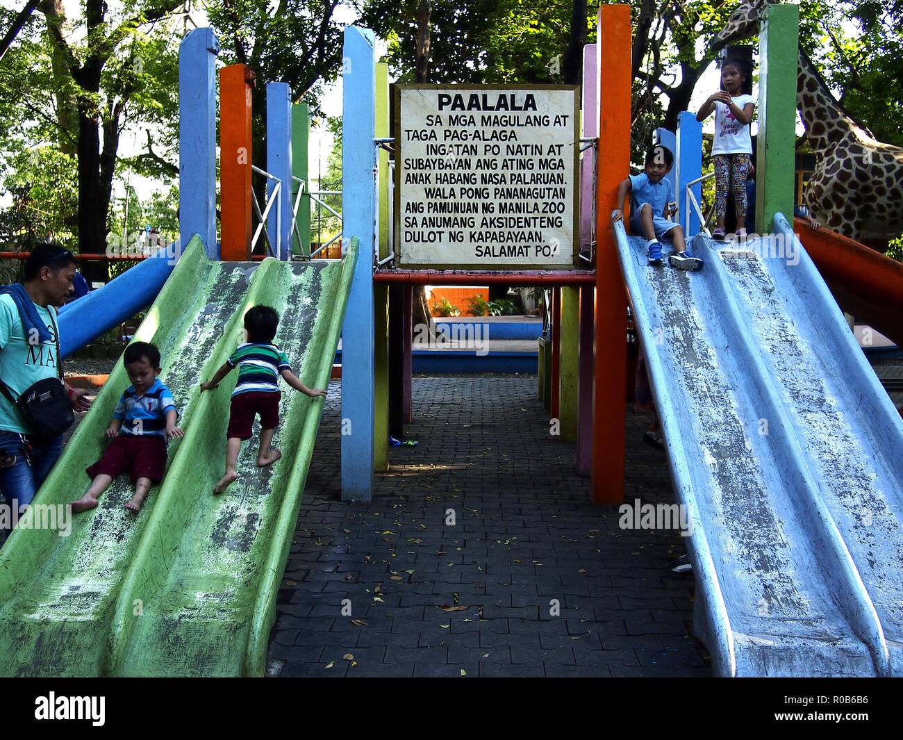 MANILA CITY, PHILIPPINES - NOVEMBER 1, 2018: Park visitors enjoy the ...