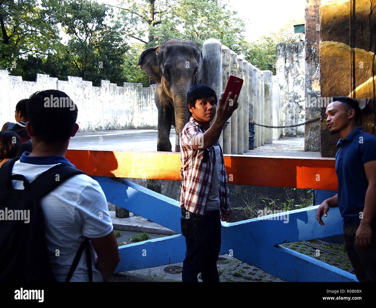 MANILA CITY, PHILIPPINES - NOVEMBER 1, 2018: Park visitors enjoy the ...