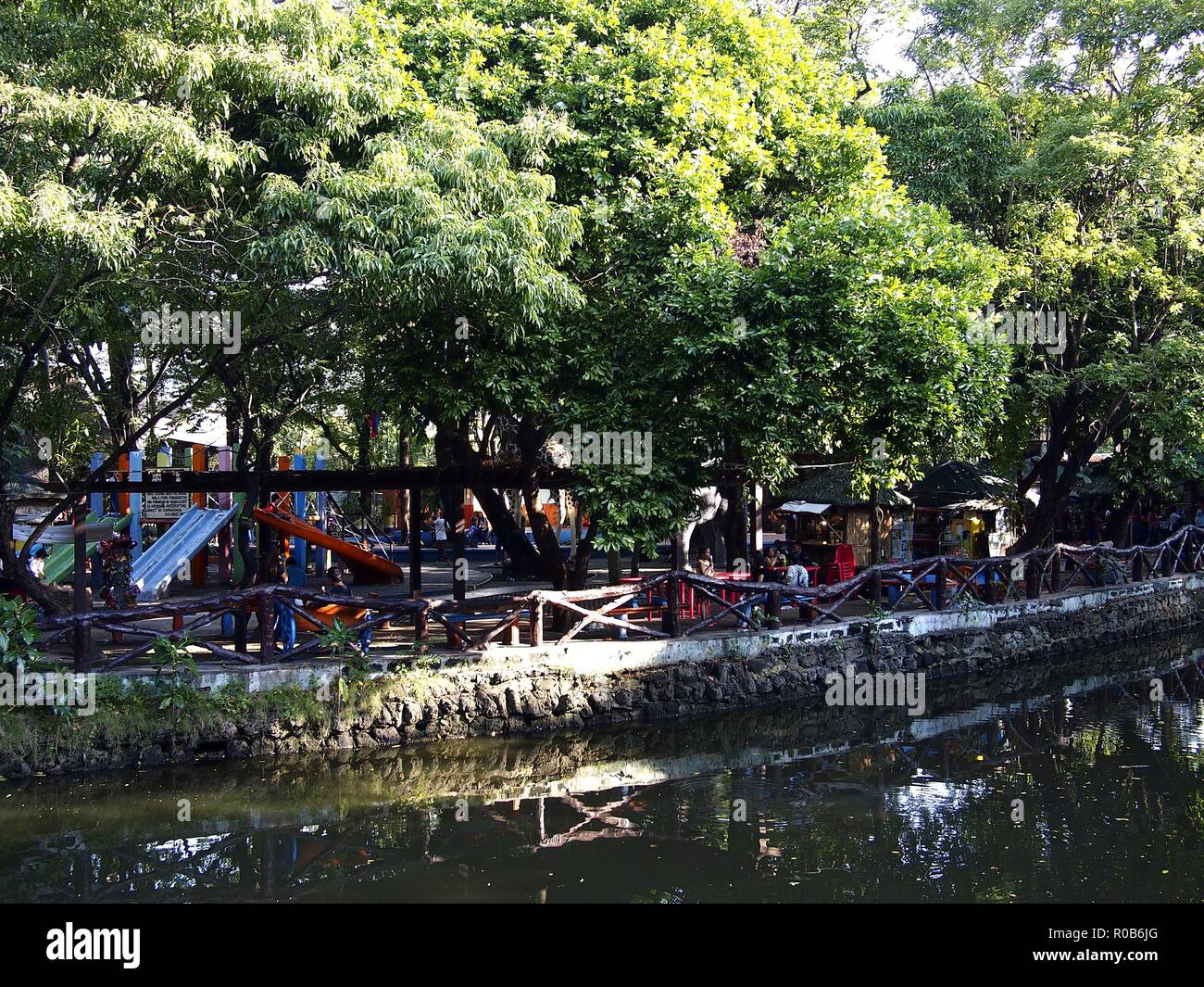 MANILA CITY, PHILIPPINES - NOVEMBER 1, 2018: Park visitors enjoy the ...