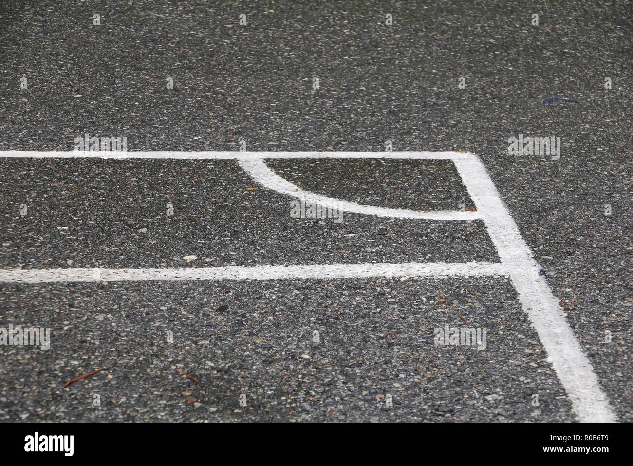 Football field corner asphalt wet Stock Photo - Alamy
