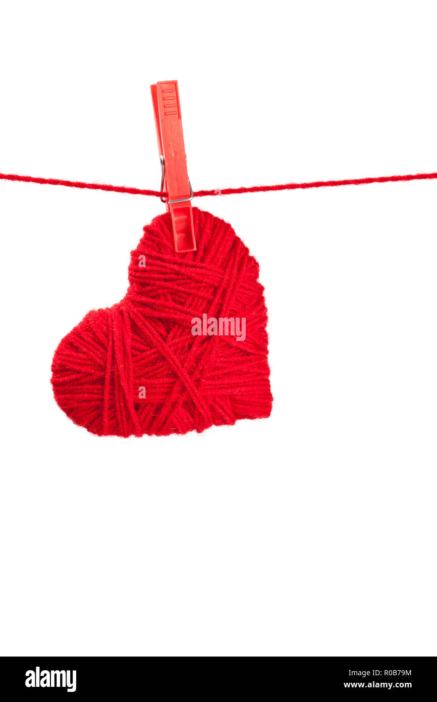 single thread heart on a red string isolated on white background Stock ...