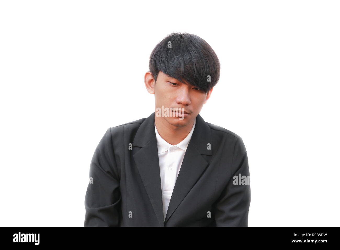 Portrait of a sad man on white background Stock Photo - Alamy