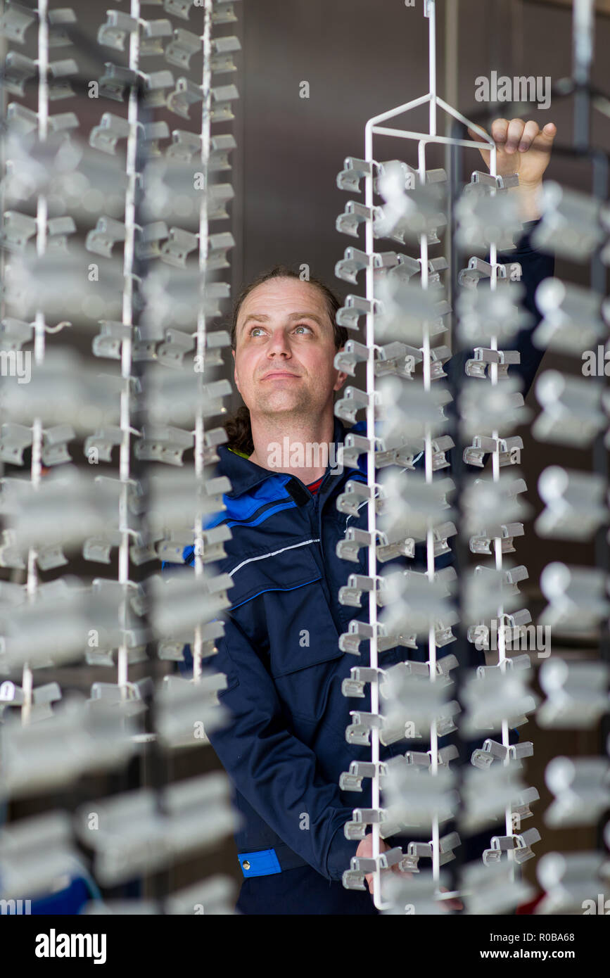 Inspecting products hi-res stock photography and images - Alamy