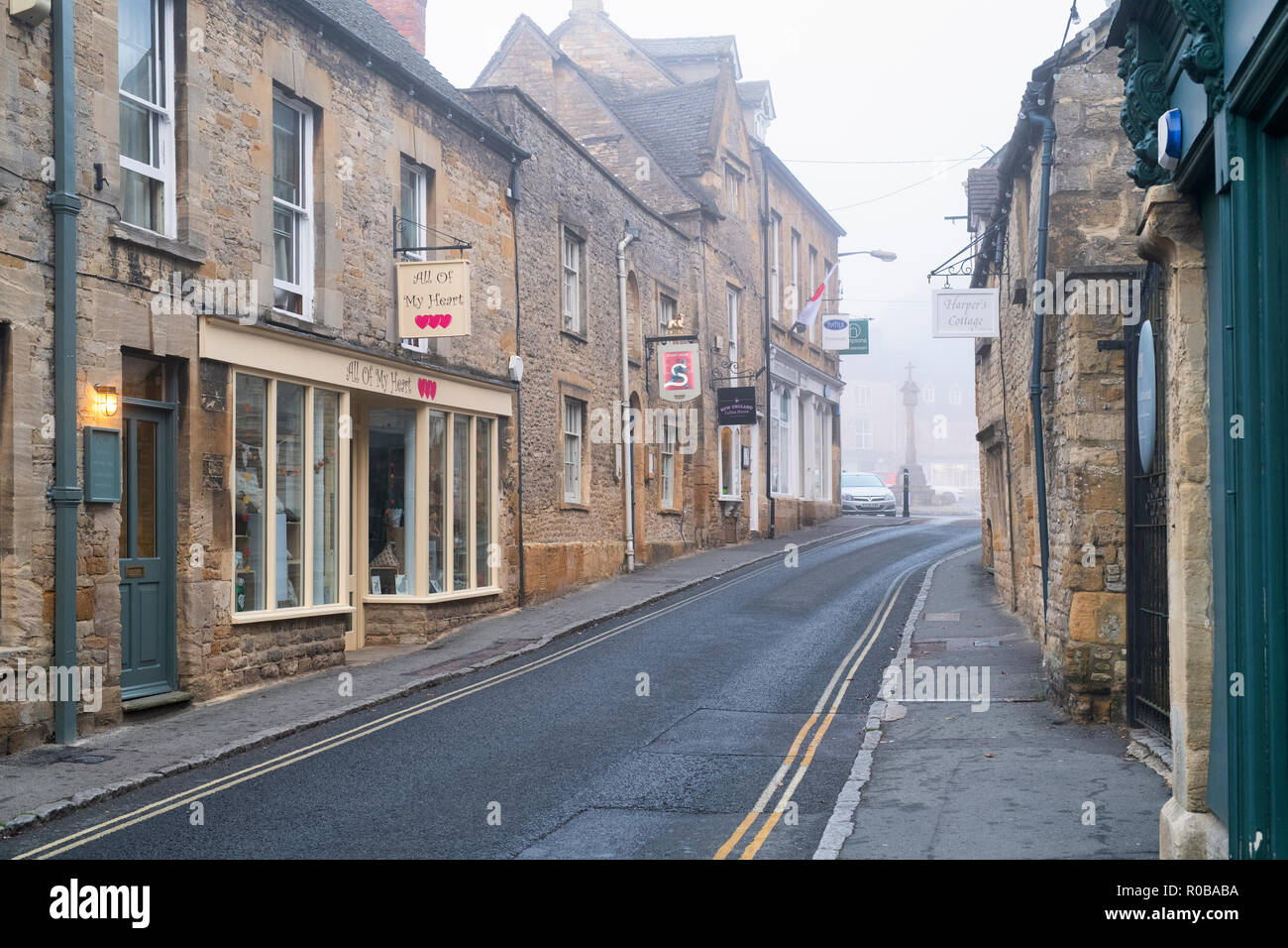 Digbeth street in the early morning autumn fog. Stow on the Wold ...