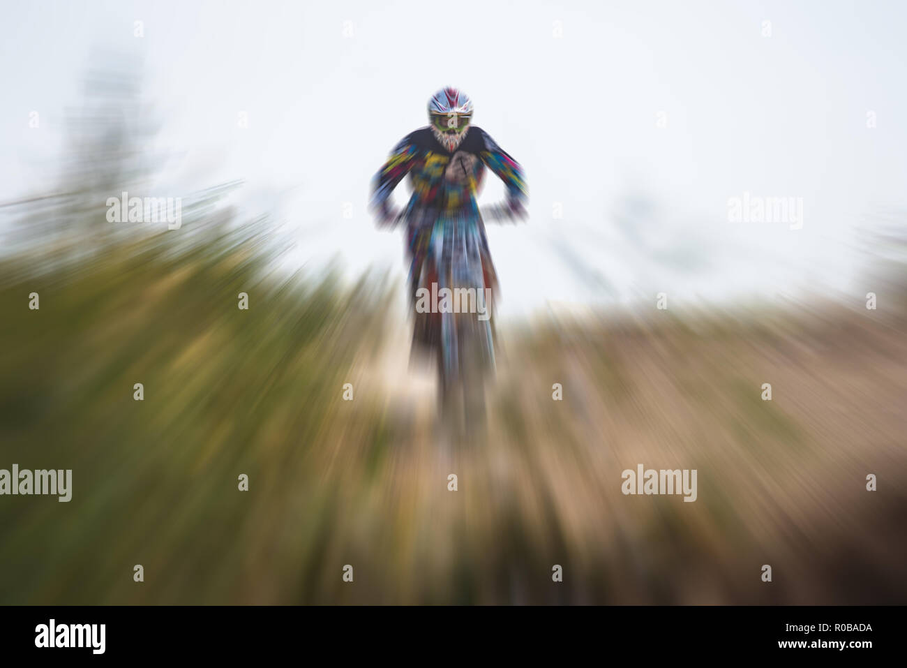 Blurry image of motorcycle riders during motocross race with zoom ...