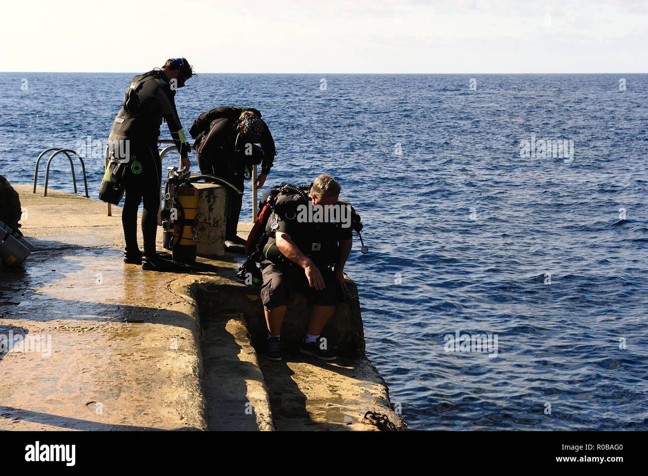Driver completing final inspection prior to a dive Stock Photo - Alamy