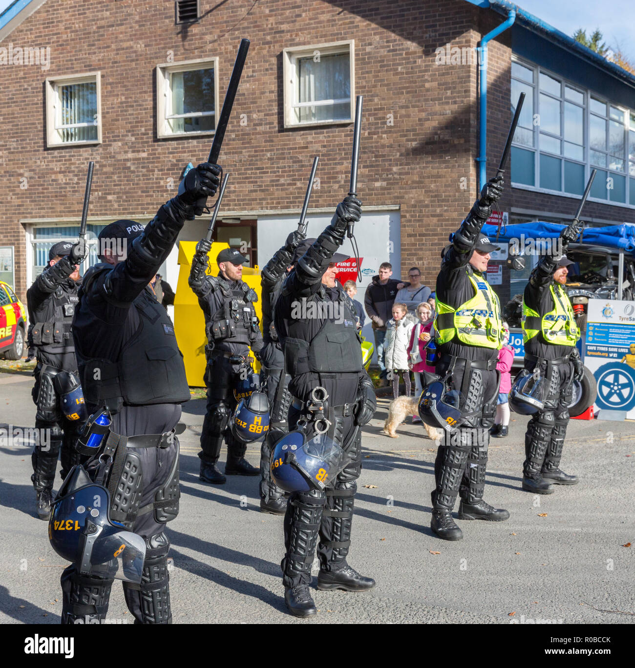 Black police woman body armour hi-res stock photography and images - Alamy