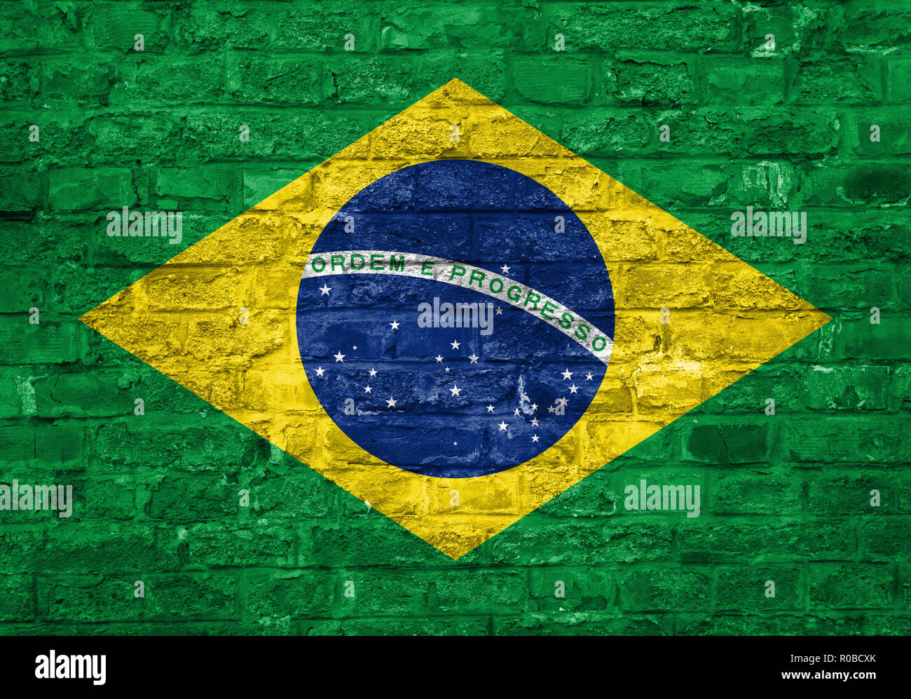 Flag of Brazil over an old brick wall background, surface Stock Photo ...