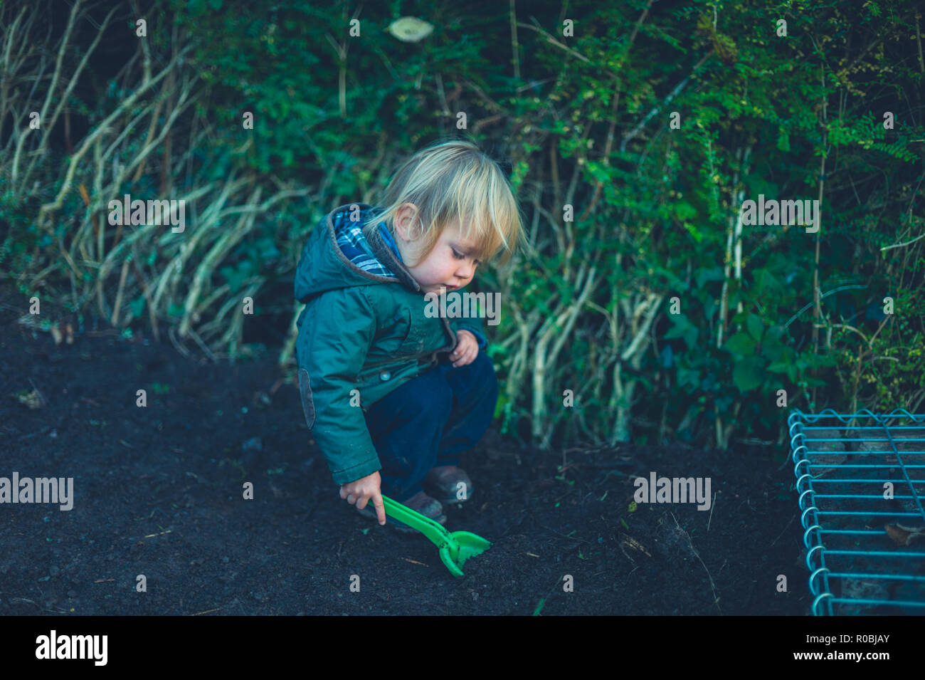 Toy spade soil hi-res stock photography and images - Alamy
