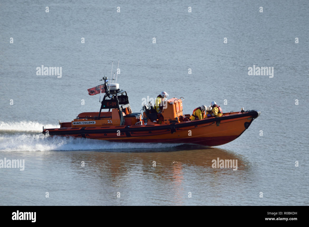 RNLI Lifeboat involved in a rescue operation on the River Thames in ...