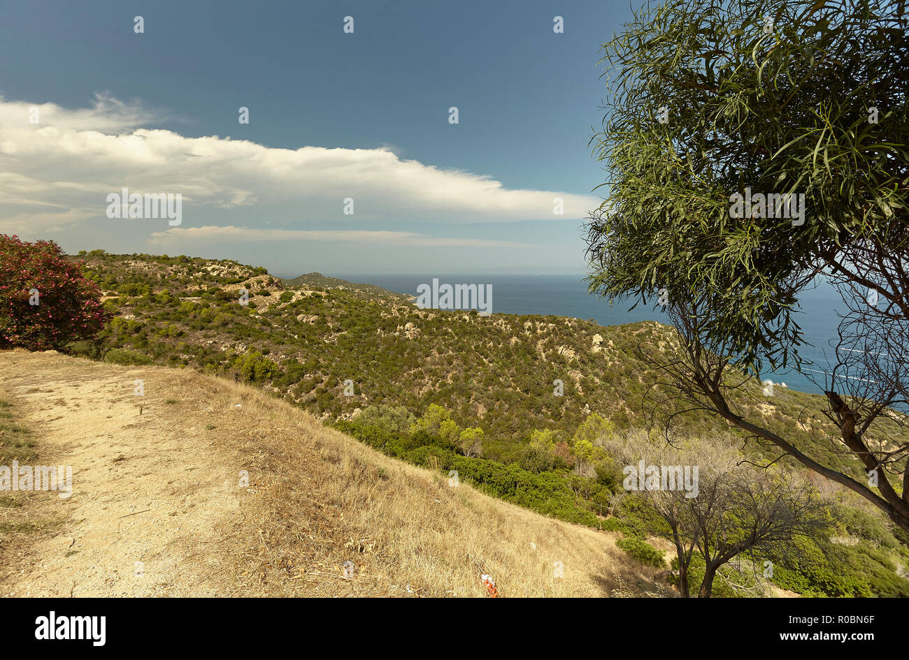 Small dirt path that runs along the south coast of the sardgena showing ...