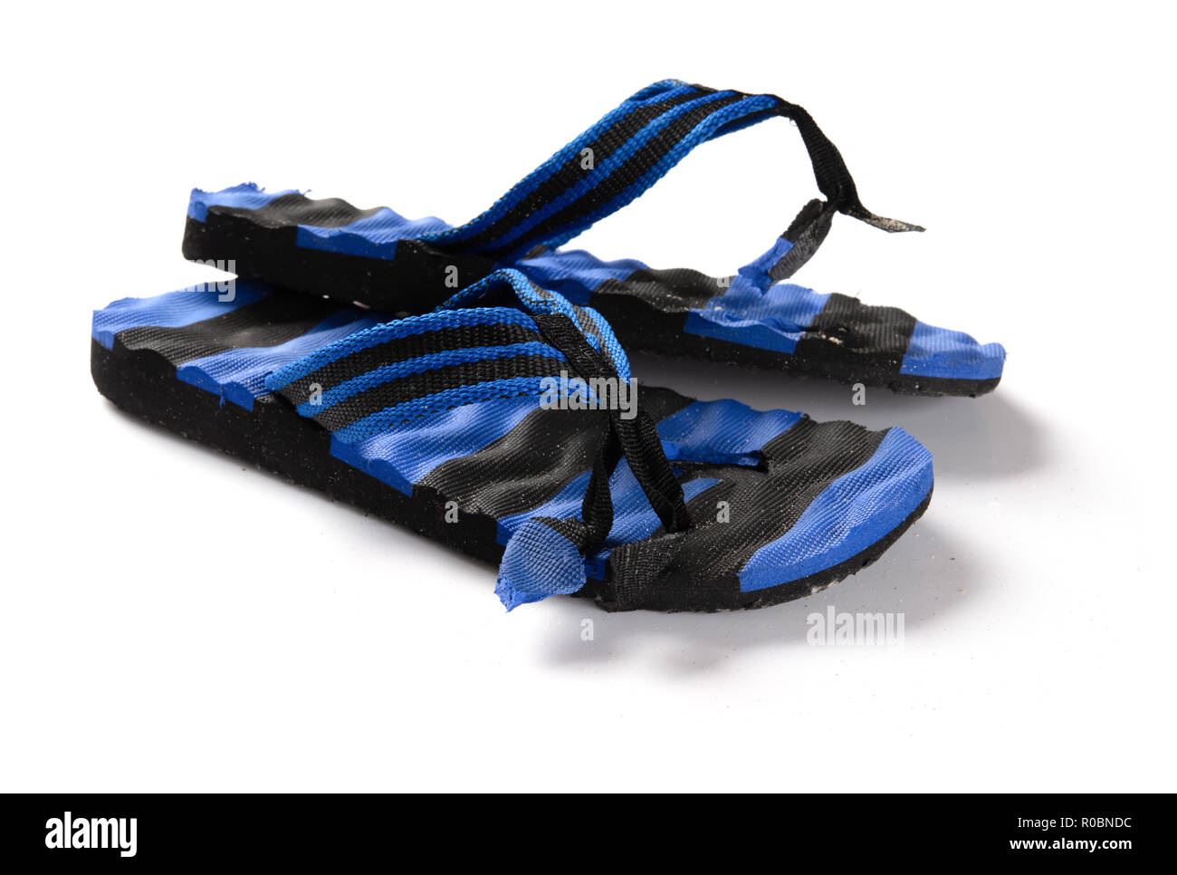 pair of badly broken slippers on white Stock Photo - Alamy