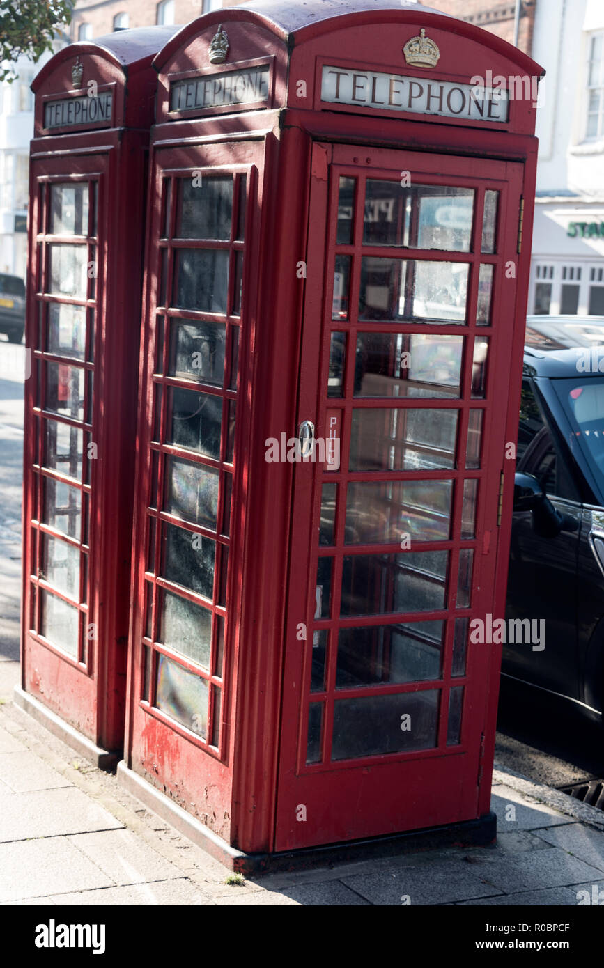 A couple of red telephone kiosks in the High Street at Marlow in ...