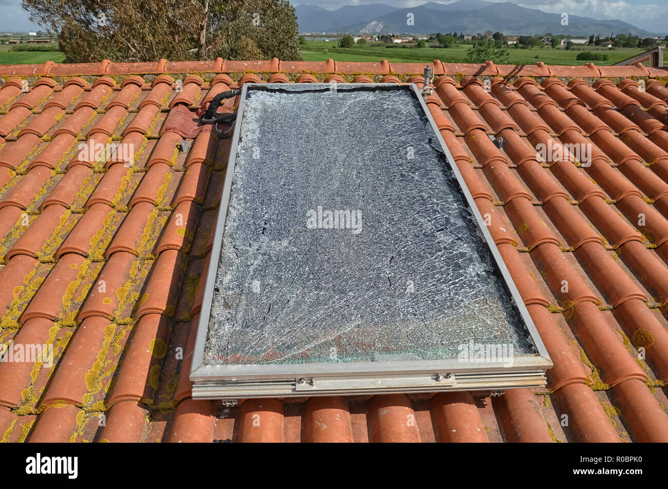 View of a solar panel damaged after a hailstorm Stock Photo - Alamy