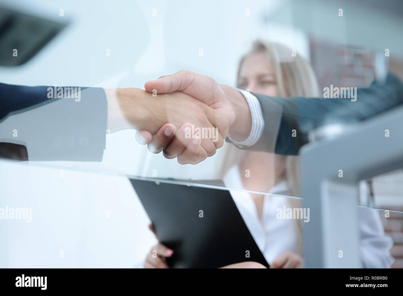 bottom view.closeup handshake financial partners. business background ...