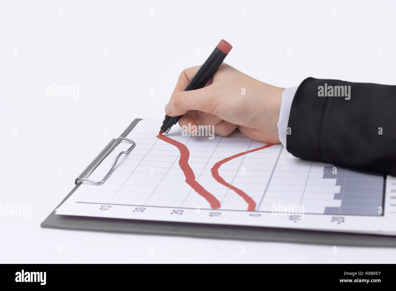 closeup .Businessman drawing a stock chart.isolated on white Stock ...