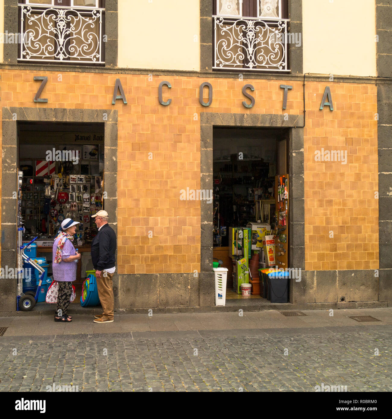 older people chatting outside hardware store in Santa Cruz de La Palma ...
