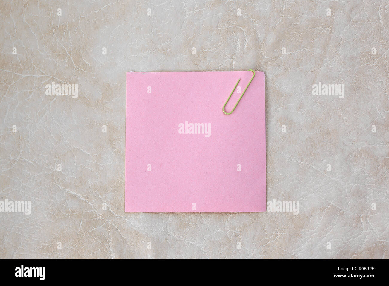 pink sheet for taking notes on a paper background.photo with copy space ...