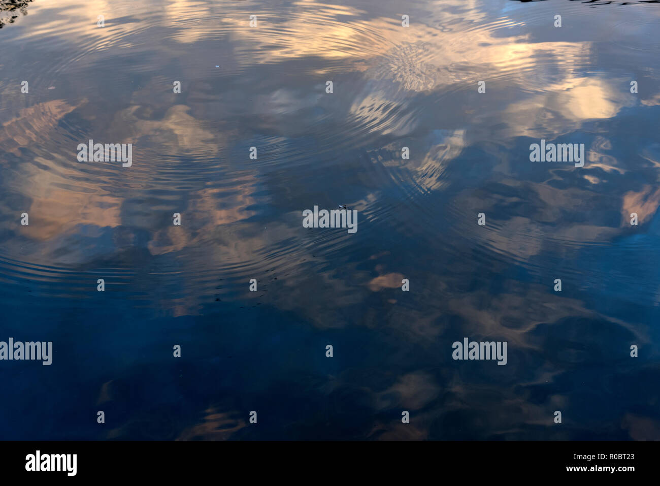 Water reflection of above clouds on the River Thames at Marlow in ...