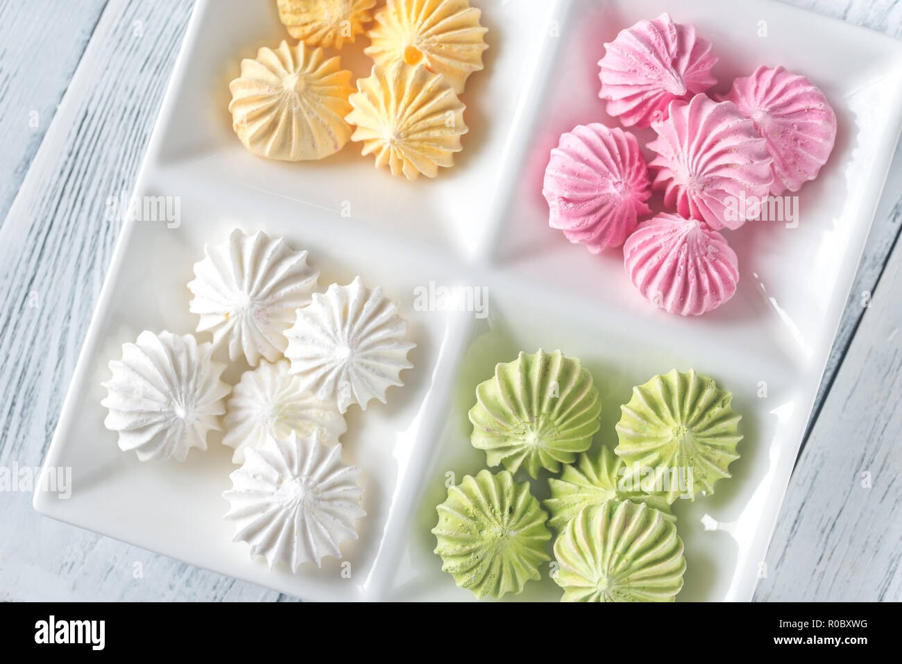 Bowl of colored meringues Stock Photo - Alamy