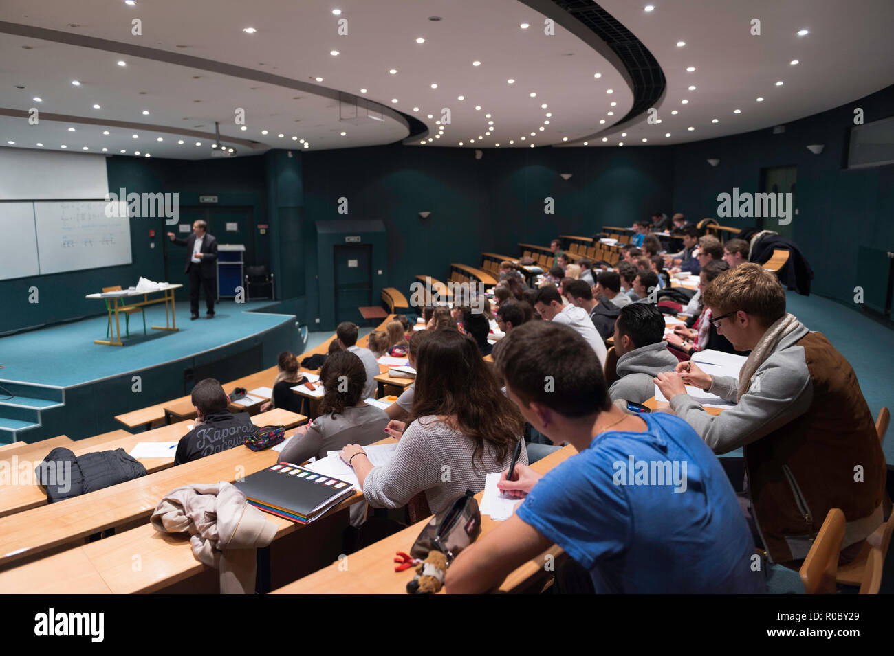 Students in a lecture theater, an auditorium Stock Photo - Alamy