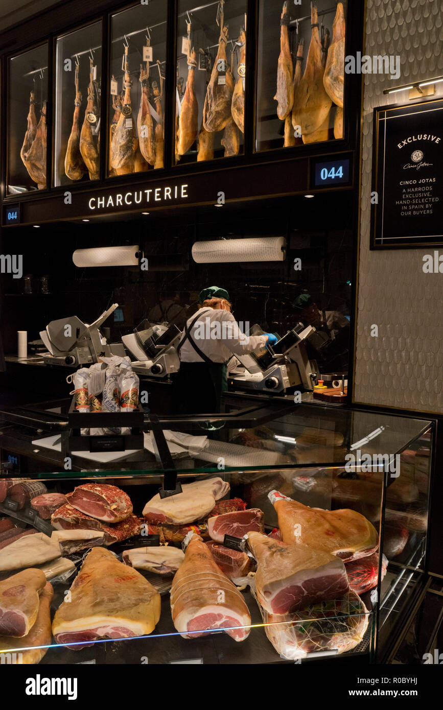 Charcuterie food counter at Harrods luxury department store. London ...
