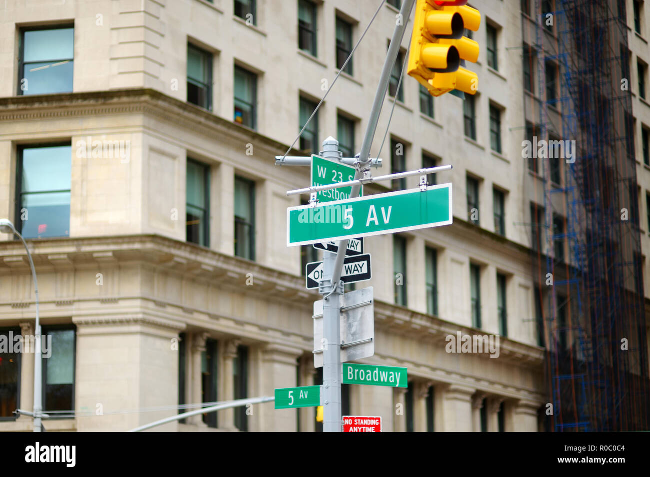 Street sign at the intersection of Broadway street and 5th Ave in New ...
