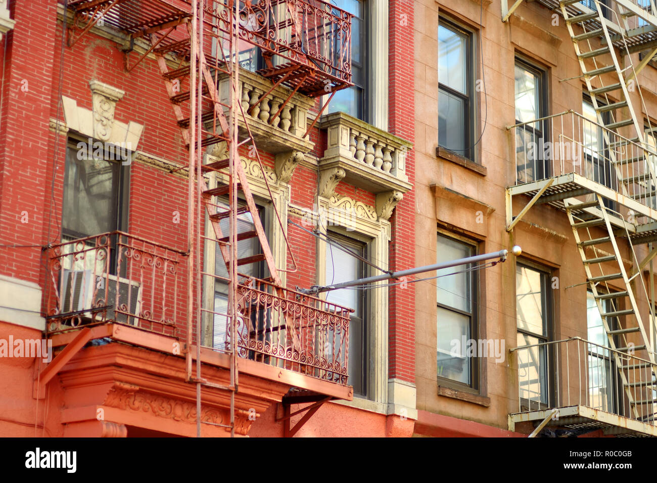 Close-up view of New York City apartment buildings with emergency ...