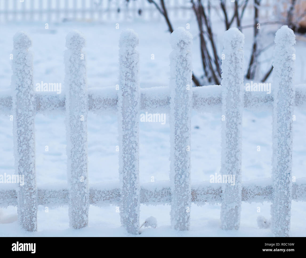 Frozen fence in the snow hi-res stock photography and images - Alamy