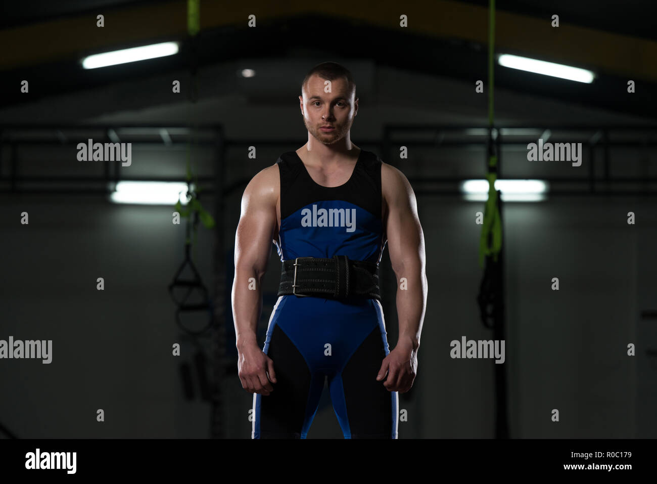 Portrait of Muscular Powerlifter Bodybuilder Fitness Model Standing ...