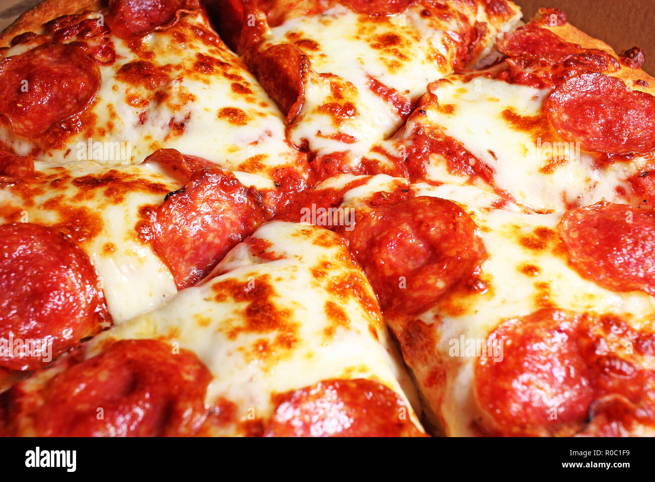 Pizza sausage american salami cheese slice slices pizza delivery Stock ...